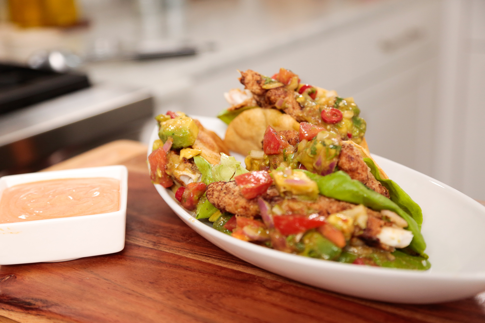 Fried Snapper Tacos with Tomato Avocado Salad and Sriracha Sour Cream